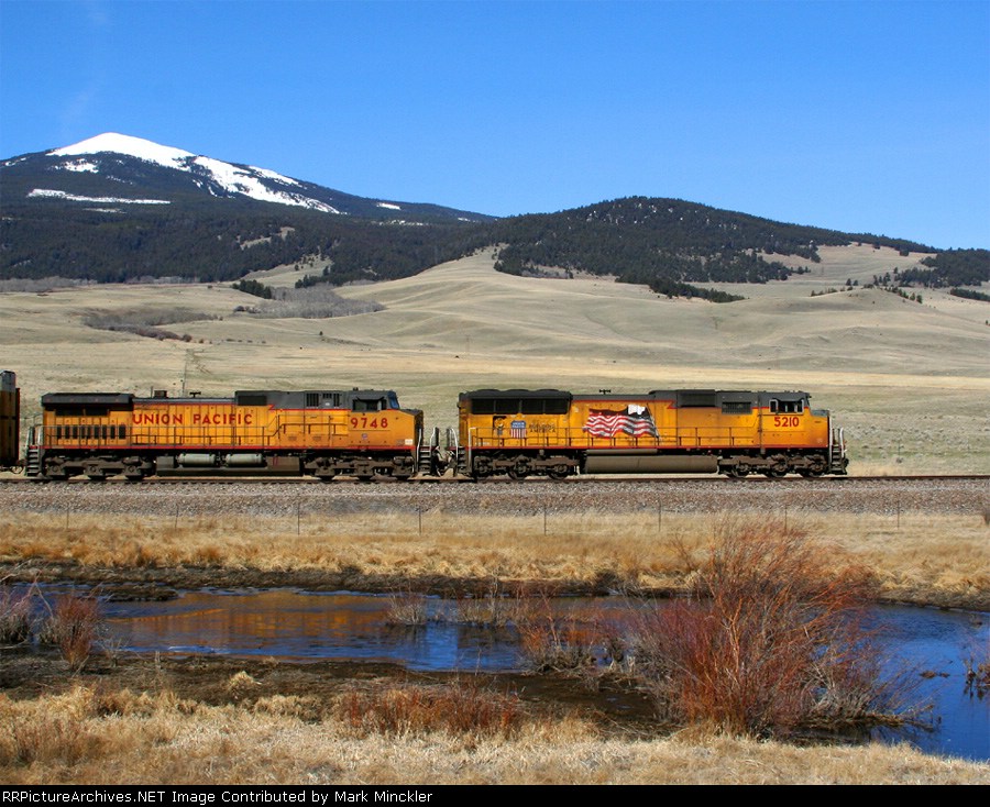 UP 5210 heads towards the Continental Divide at Deer Lodge Pass